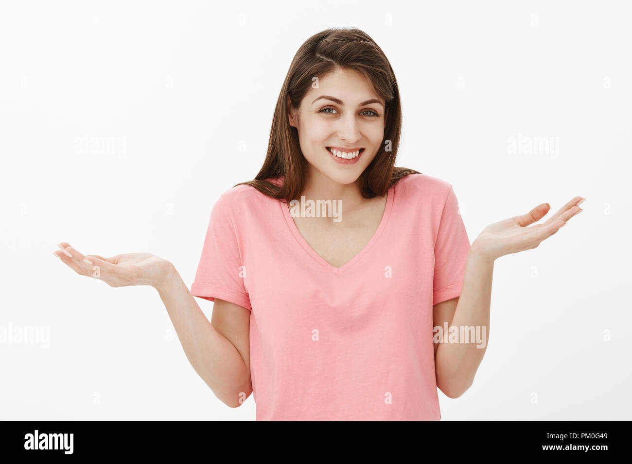 Do not want know. Indifferent and carefree charming woman in pink t ...