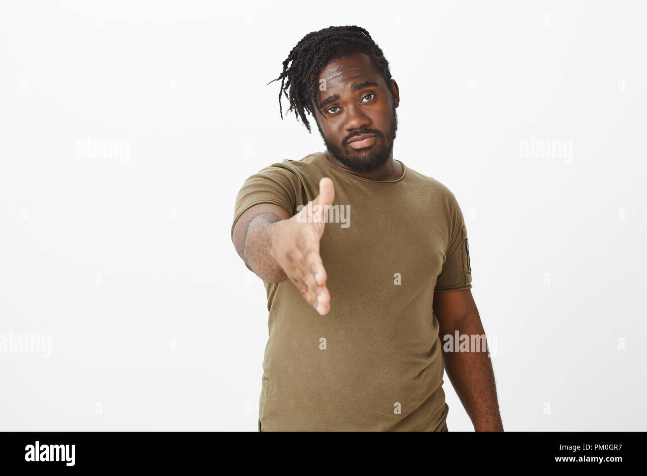 Indoor shot of confident serious-looking african guy with beard ...