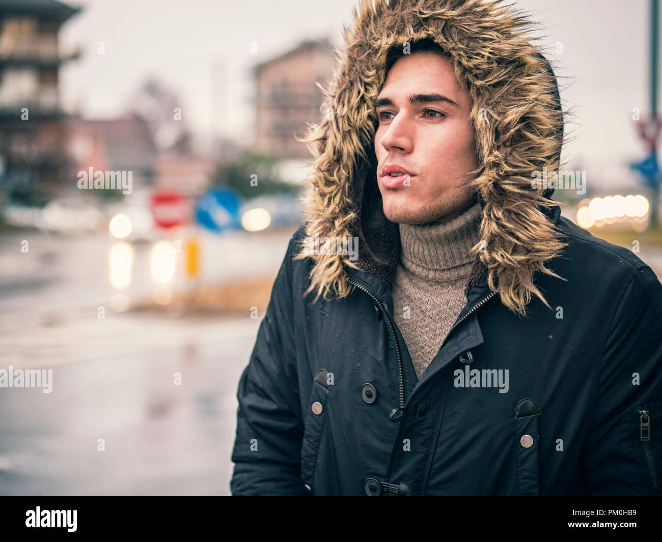 Grey rain coat hi-res stock photography and images - Alamy