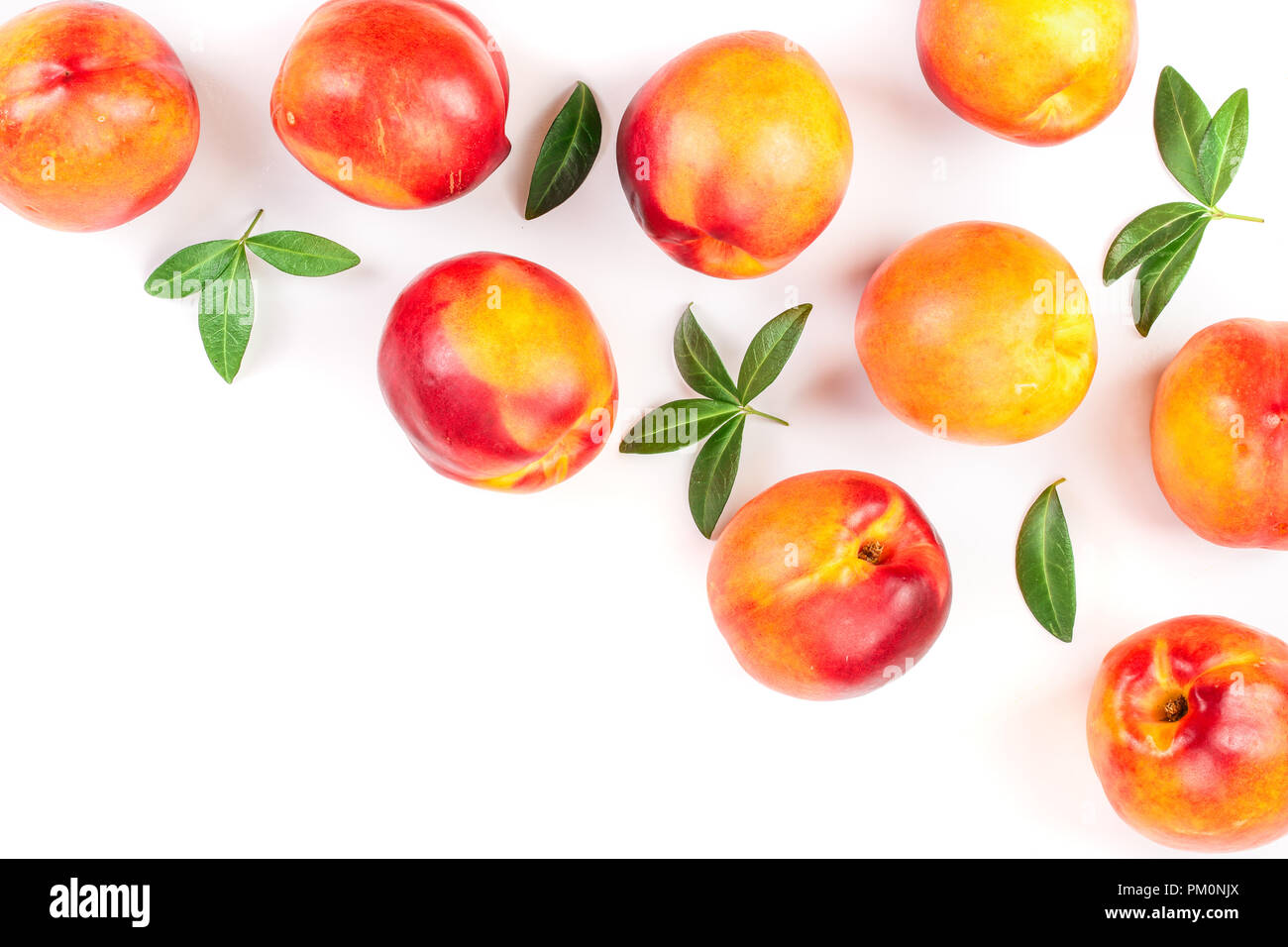 ripe nectarine with leaves isolated on white background with copy space ...