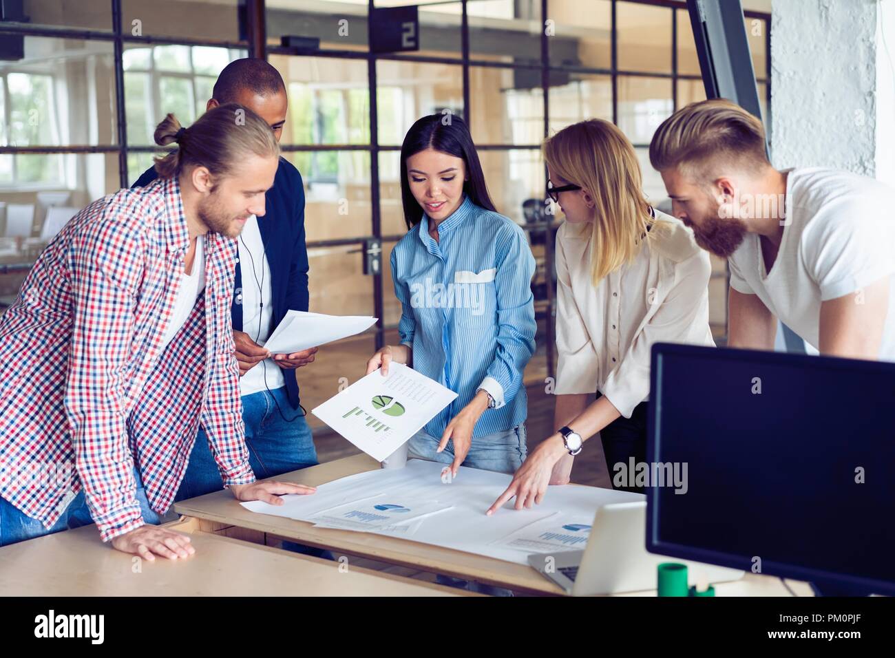 Successful team. Group of young business people working and ...