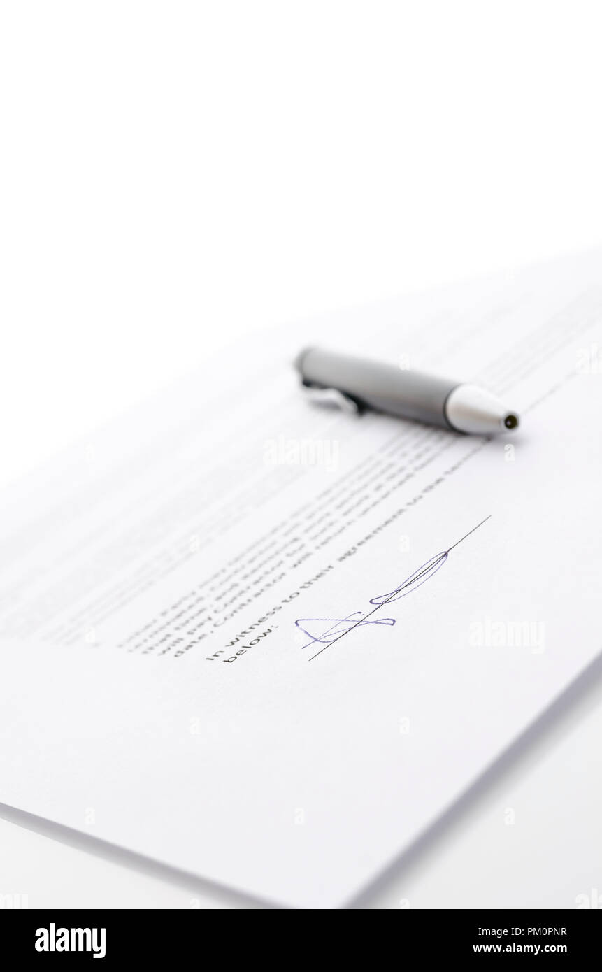Contract and a pen with copy space. Focus on a signature Stock Photo ...