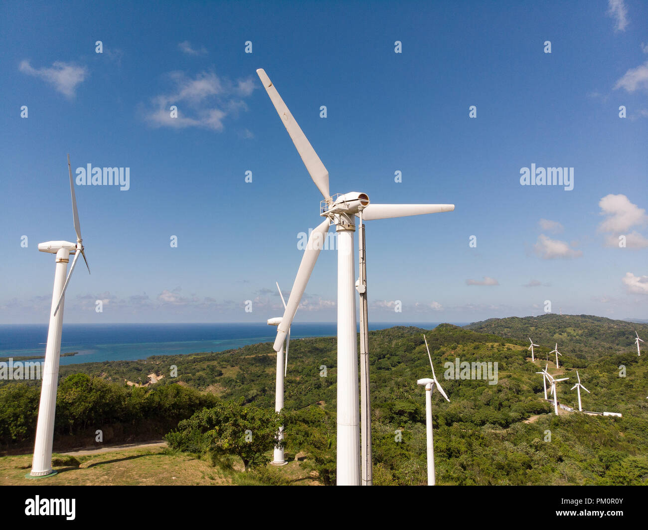 Wind turbines on mountainous Caribbean island Stock Photo - Alamy