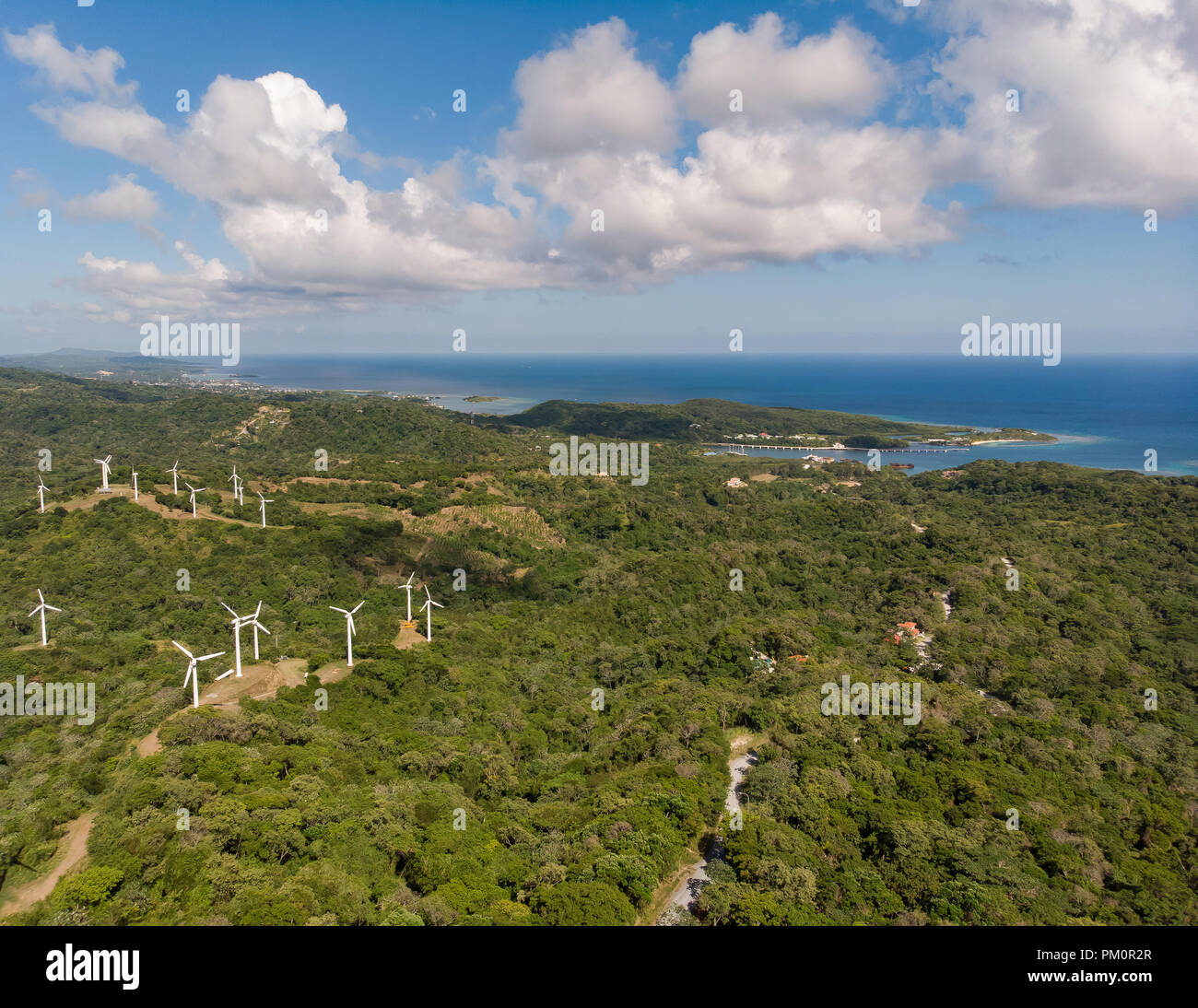 Wind turbines on mountainous Caribbean island Stock Photo - Alamy