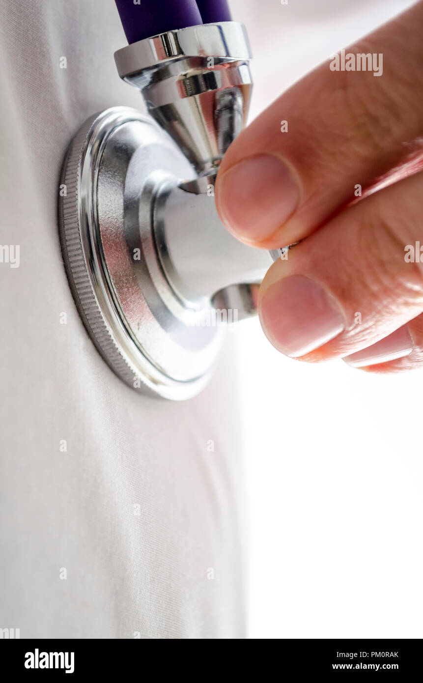 Closeup photo of examining the patient with stethoscope Stock Photo - Alamy