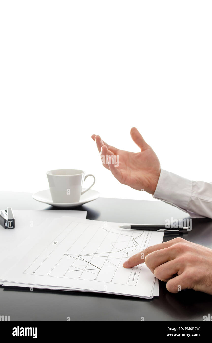 Businessman explaining financial reports on a black desk. With white ...