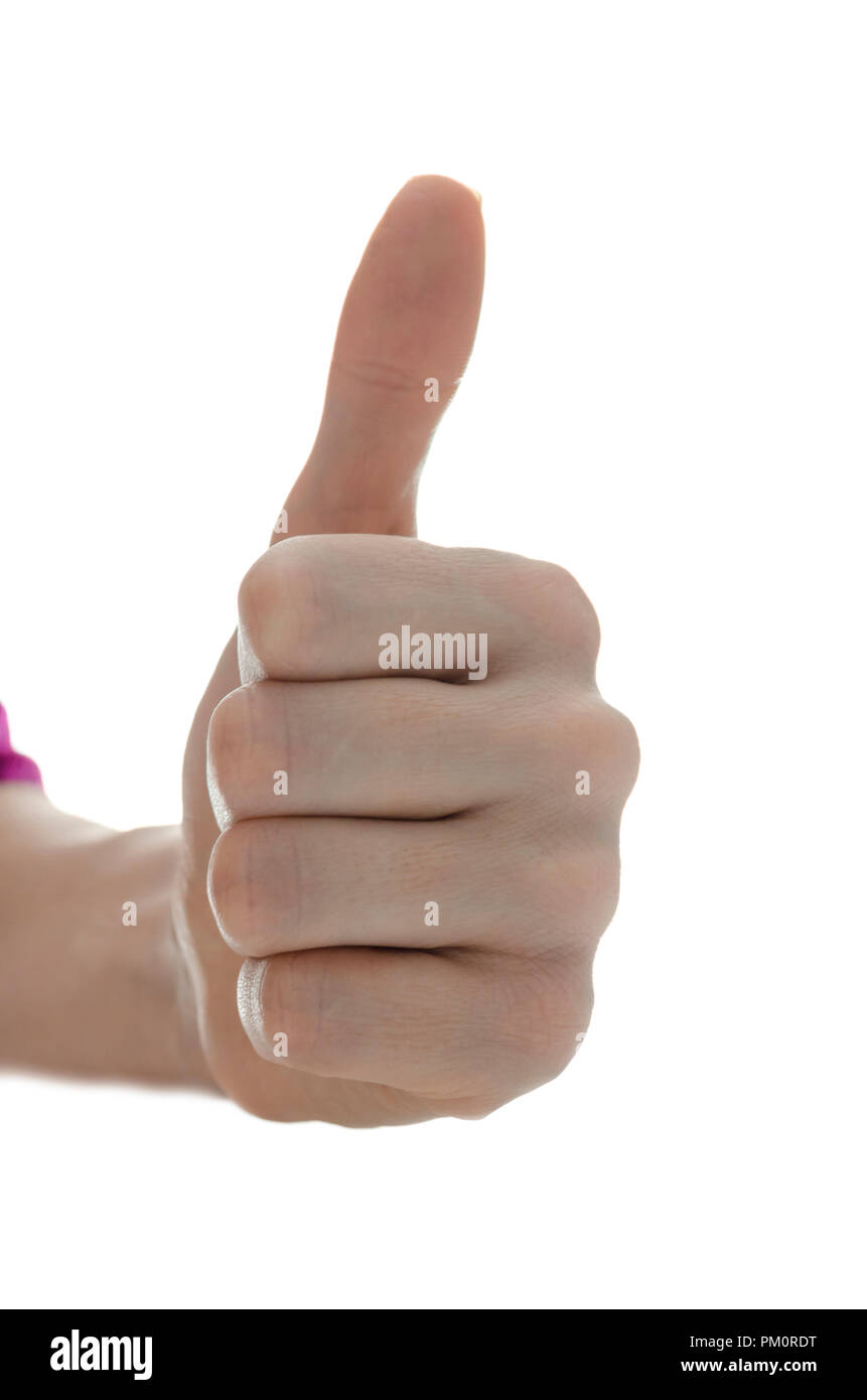 Front view of a female hand showing a thumbs up sign. Isolated on a ...