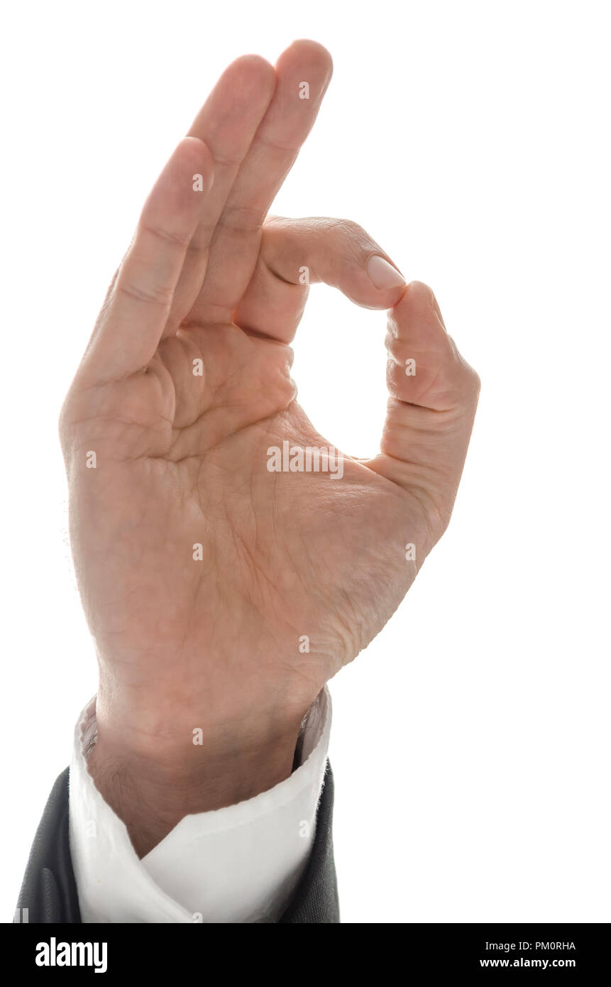 Hand of a businessman showing an Ok sign. Isolated over white ...