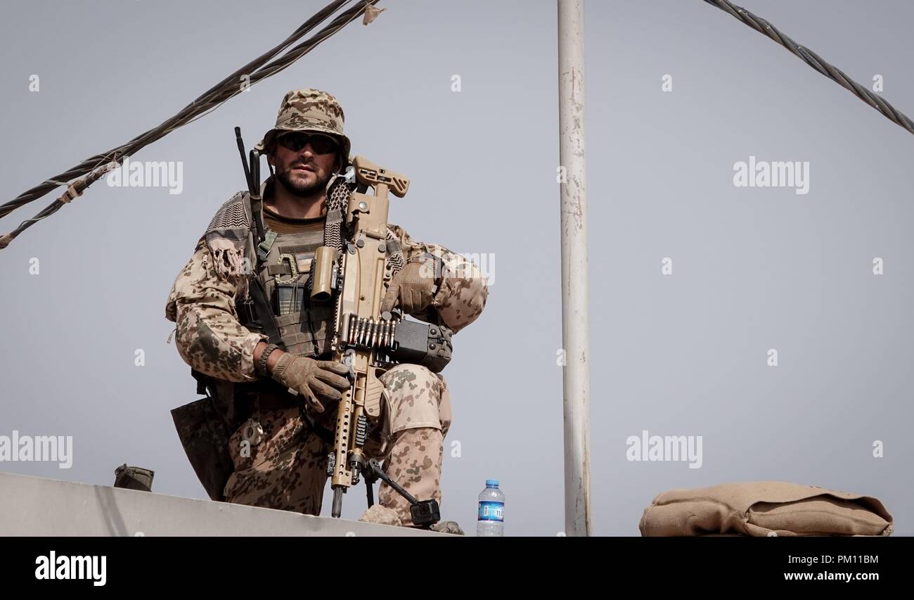 Taji, Iraq. 16th Sep, 2018. A heavily armed German soldier guarding the ...