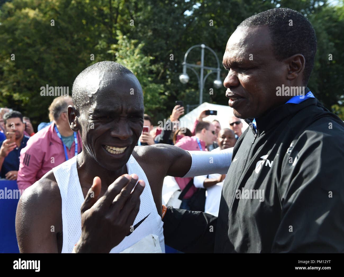 Berlin, Germany. 16th Sep, 2018. Eliud Kipchoge (KEN), left, celebrates ...