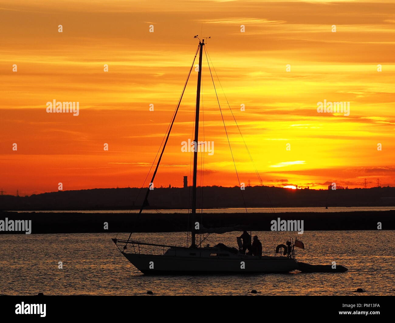 Queenborough, Kent, UK. 16th Sep, 2018. UK Weather: a colourful sunset ...