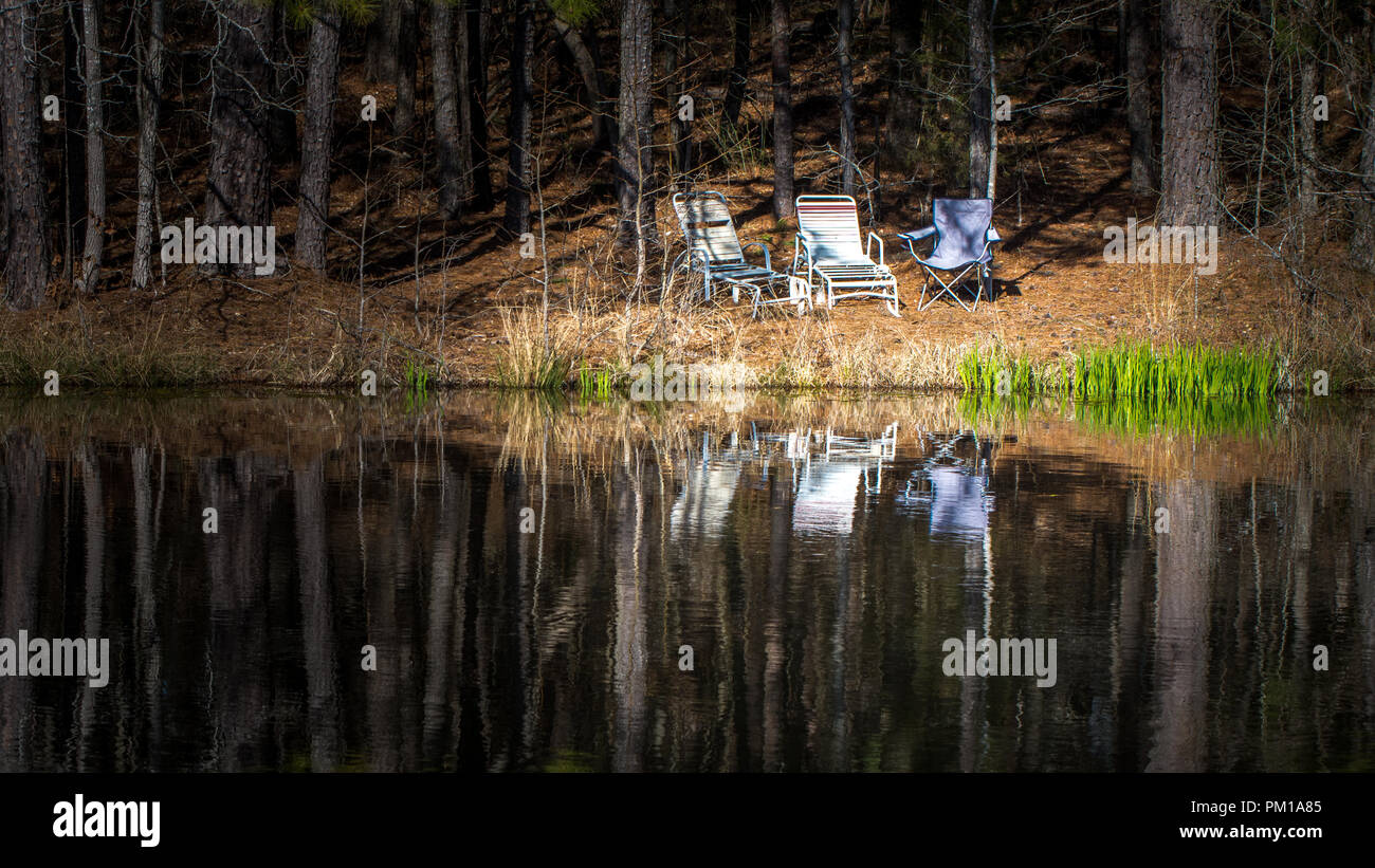 Green folding chair on grass hi-res stock photography and images - Alamy