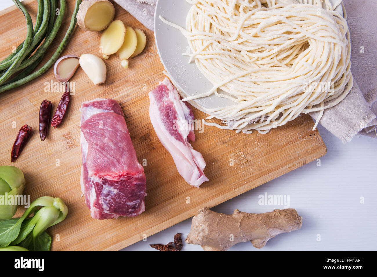 Chinese pasta, fresh noodles and meat, and other vegetables Stock Photo ...