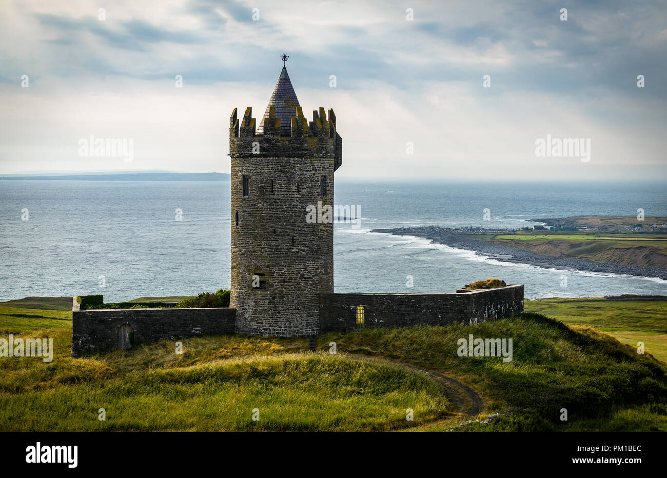 Ancient tower on Irish coast Stock Photo - Alamy