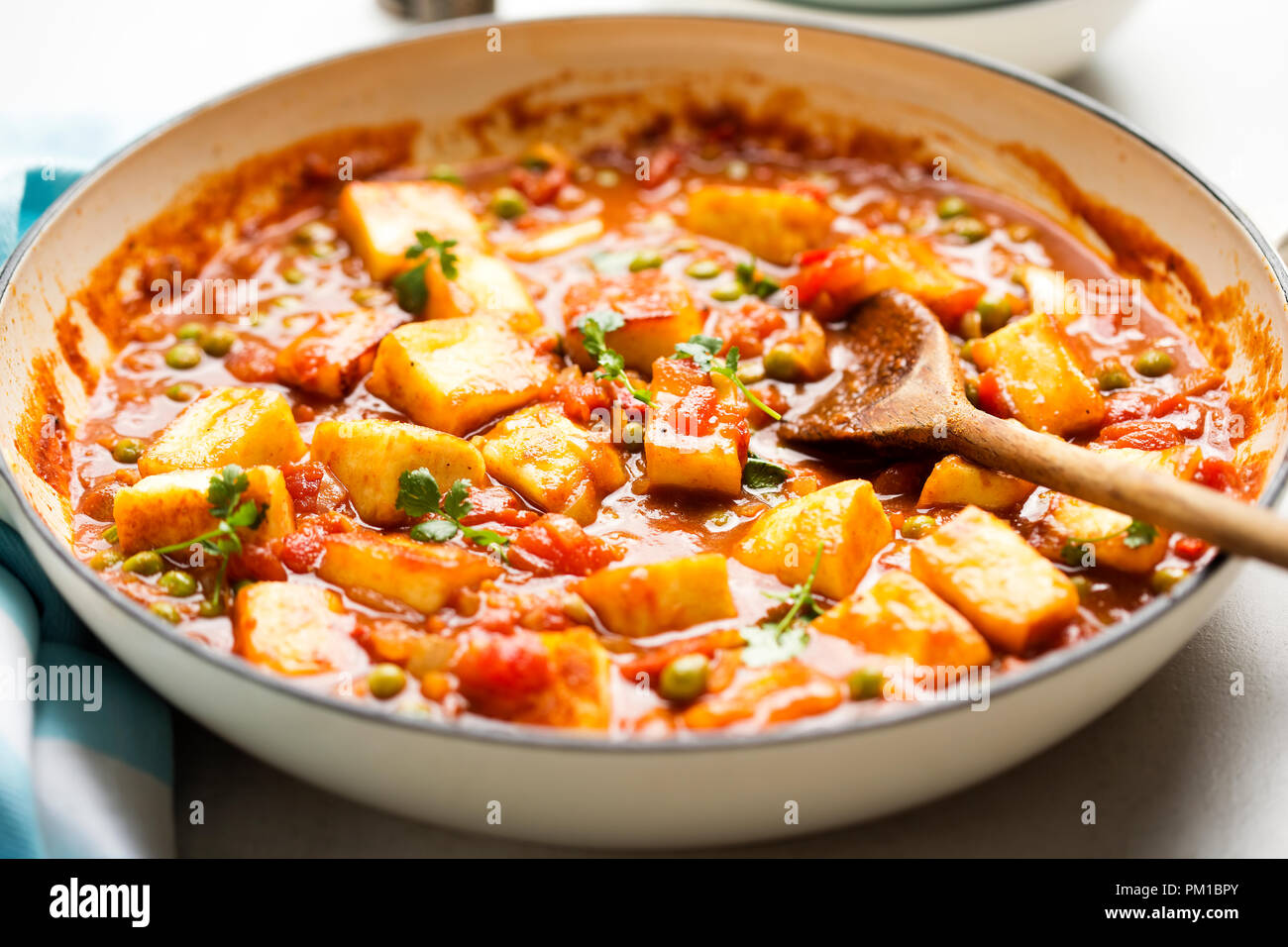 Matar paneer with with paneer cheese, peas and tomato sauce Stock Photo ...