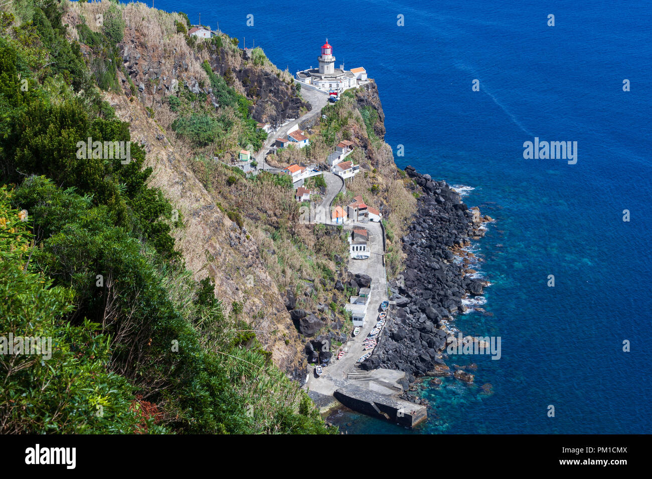view of arnel lighthouse sao miguel azores on the cliffside Stock Photo ...