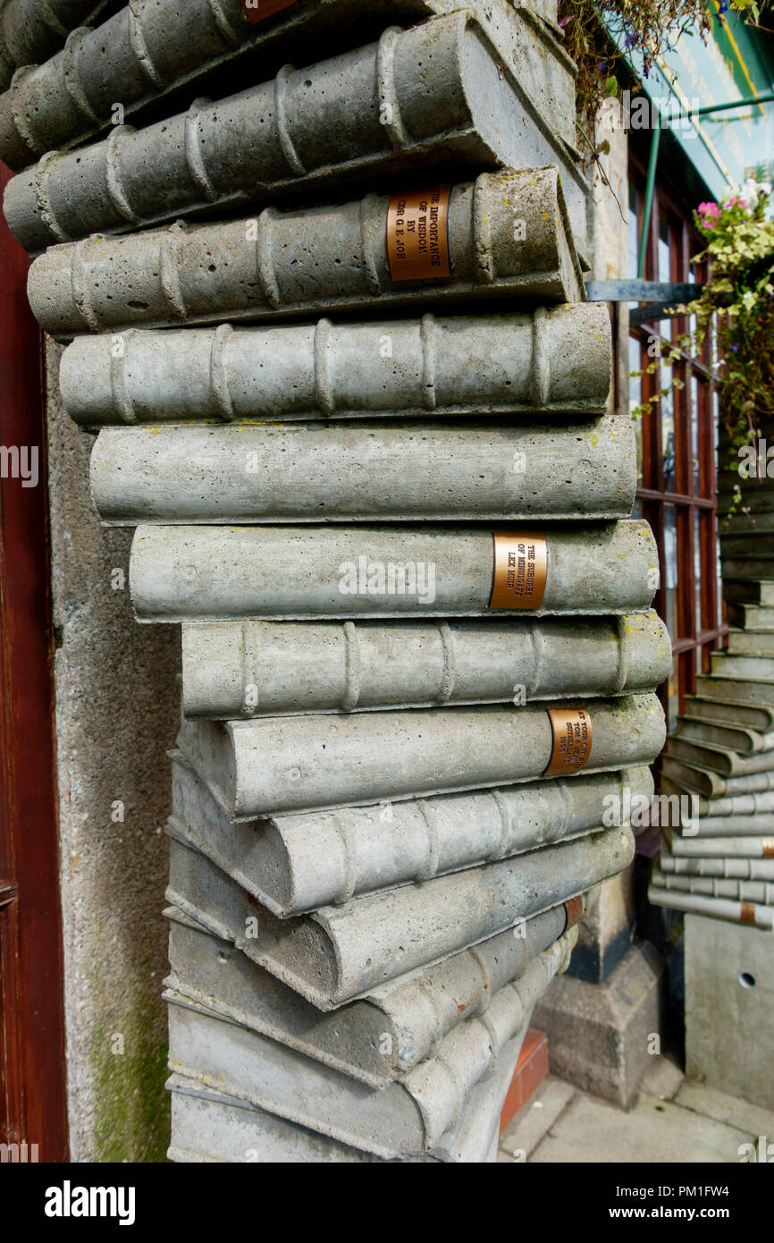Book sculpture made from cement outside The Book Shop in Wigtown ...