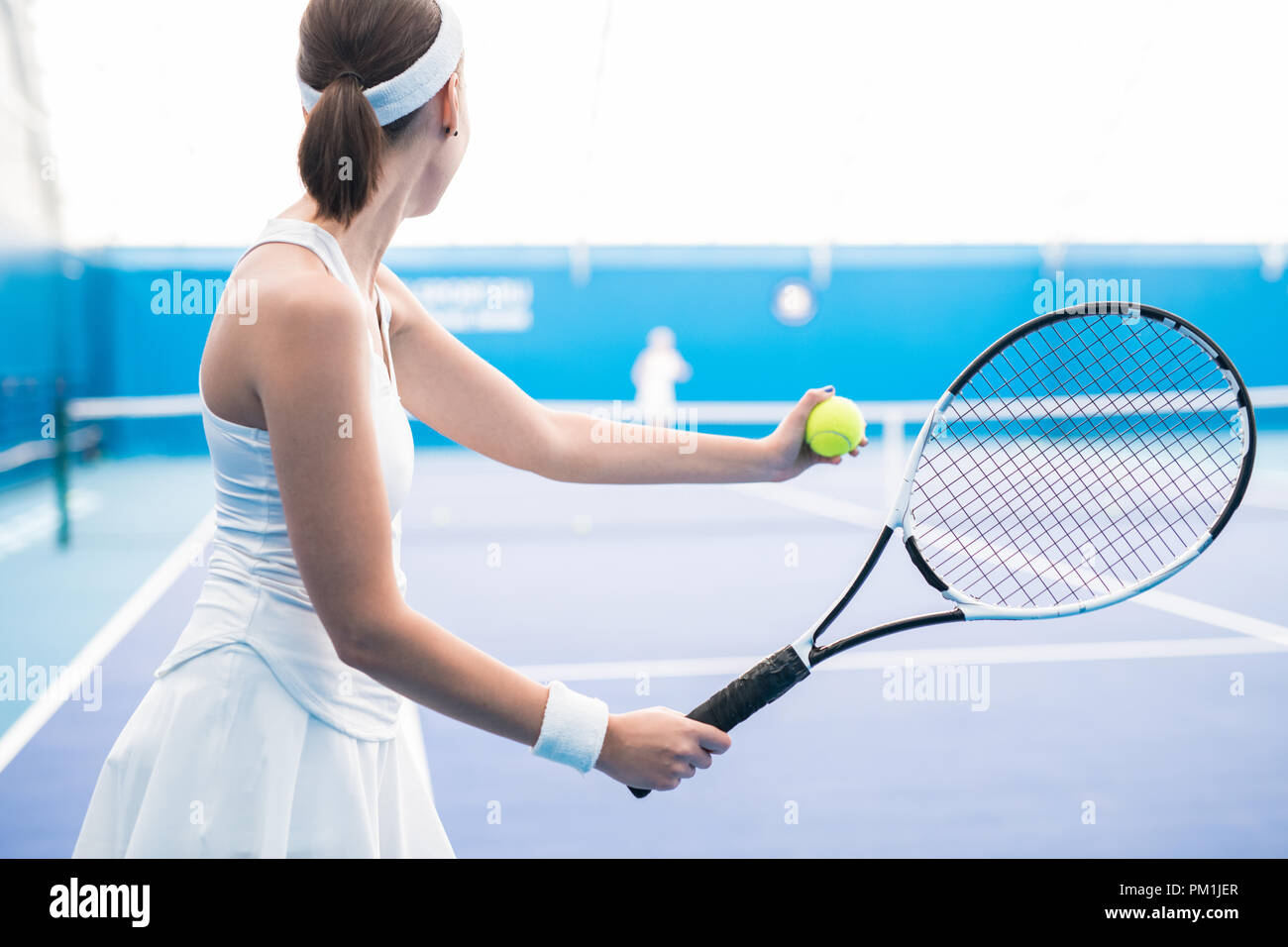Tennis Player Serving Ball Stock Photo - Alamy