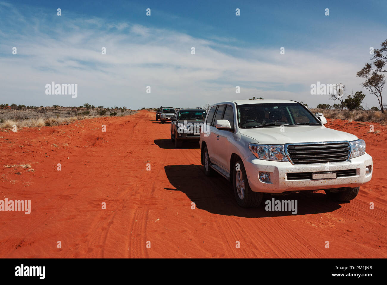 4wd off road vans on red soil Outback Australia Stock Photo - Alamy