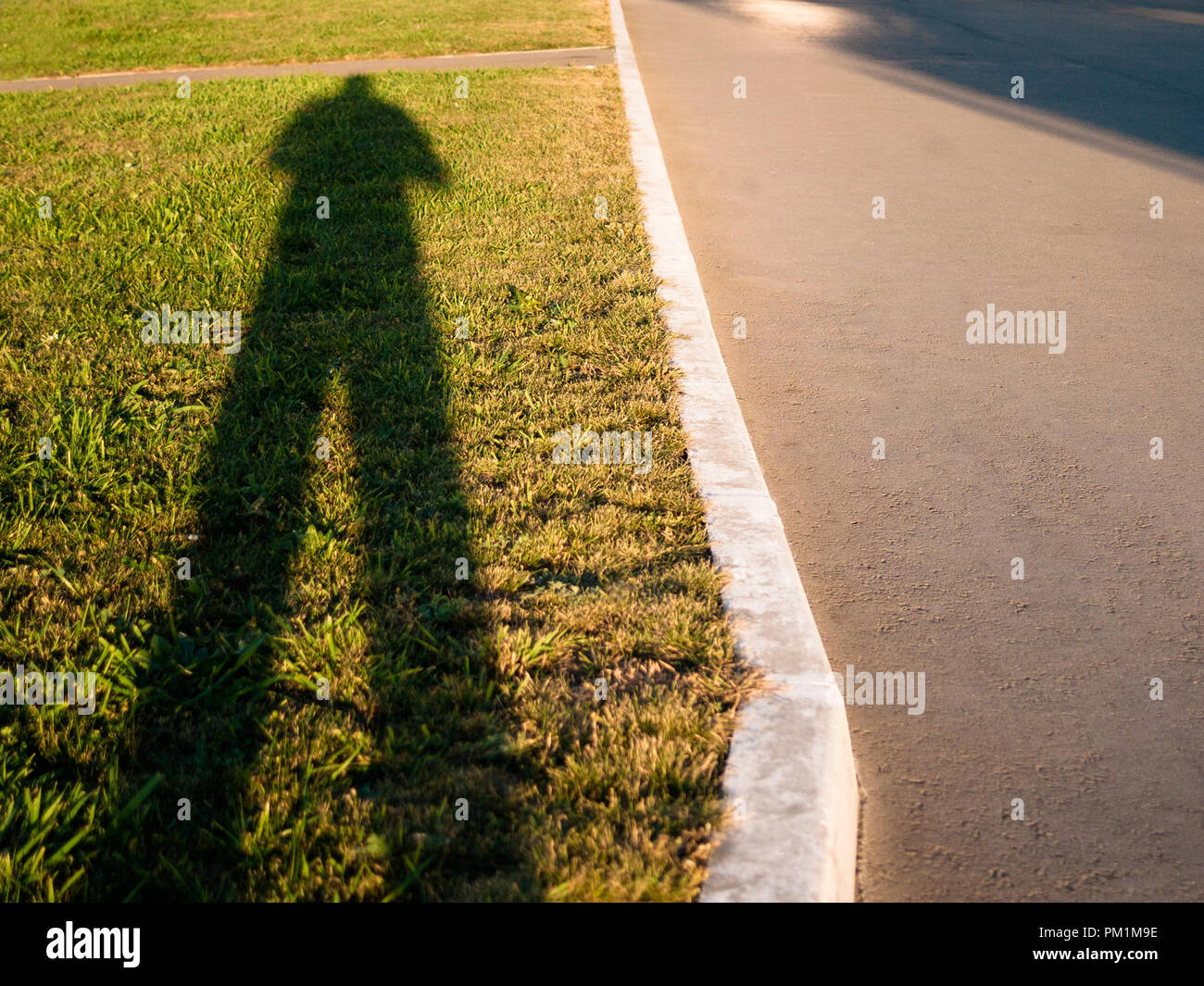 Curb street sidewalk shadow hi-res stock photography and images - Alamy