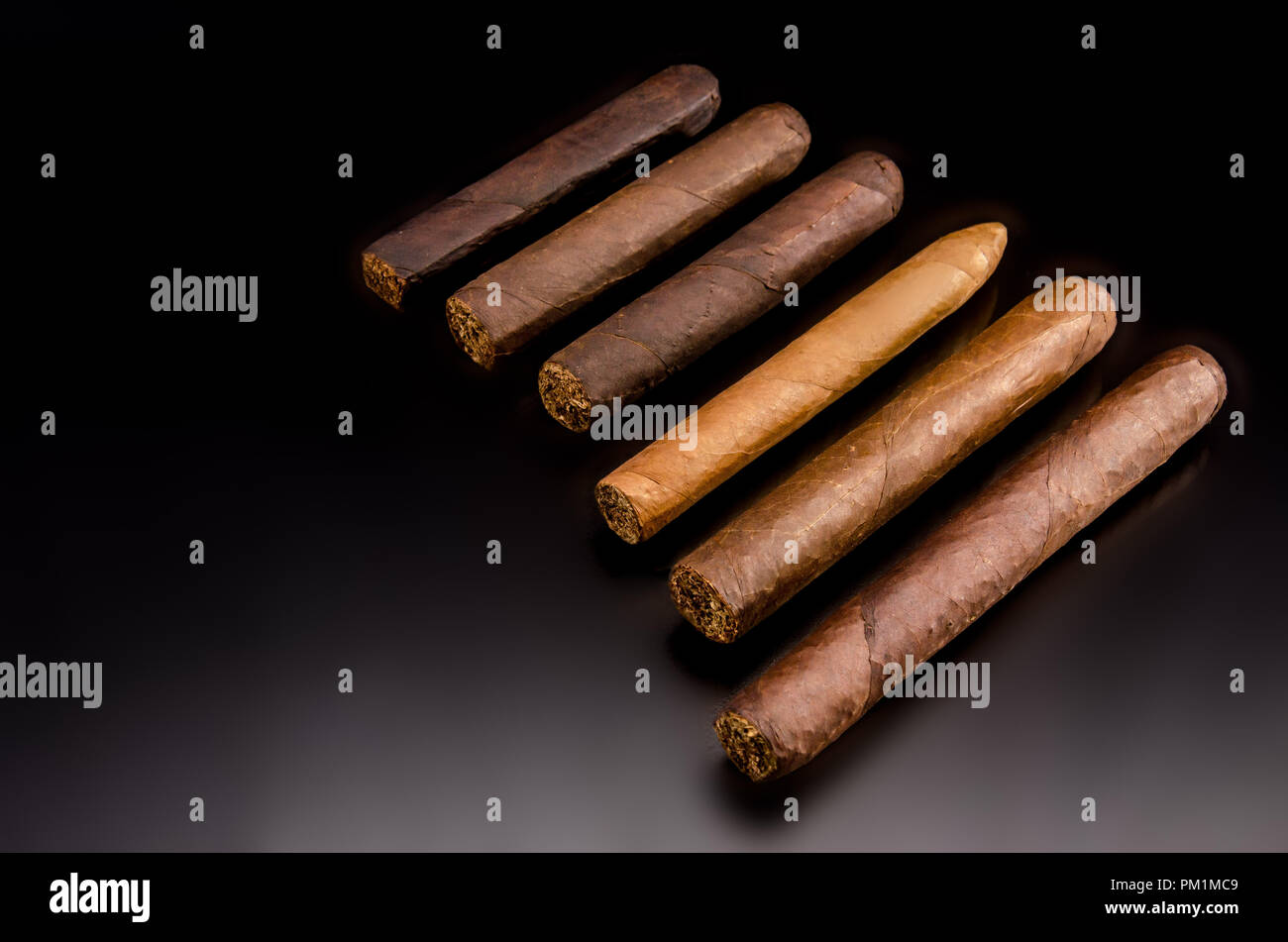 Handcrafted cigar made of tobacco leafs Stock Photo - Alamy