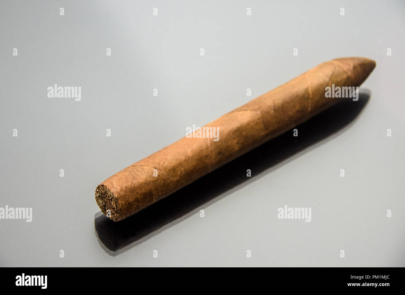 Handcrafted cigar made of tobacco leafs Stock Photo - Alamy