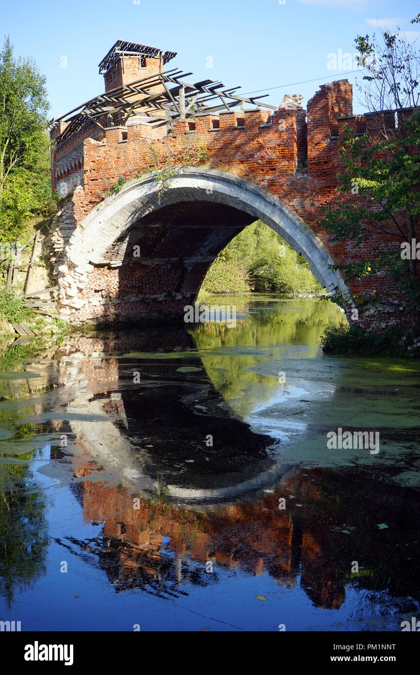 Old brick bridge in Marfino park, Russia Stock Photo - Alamy