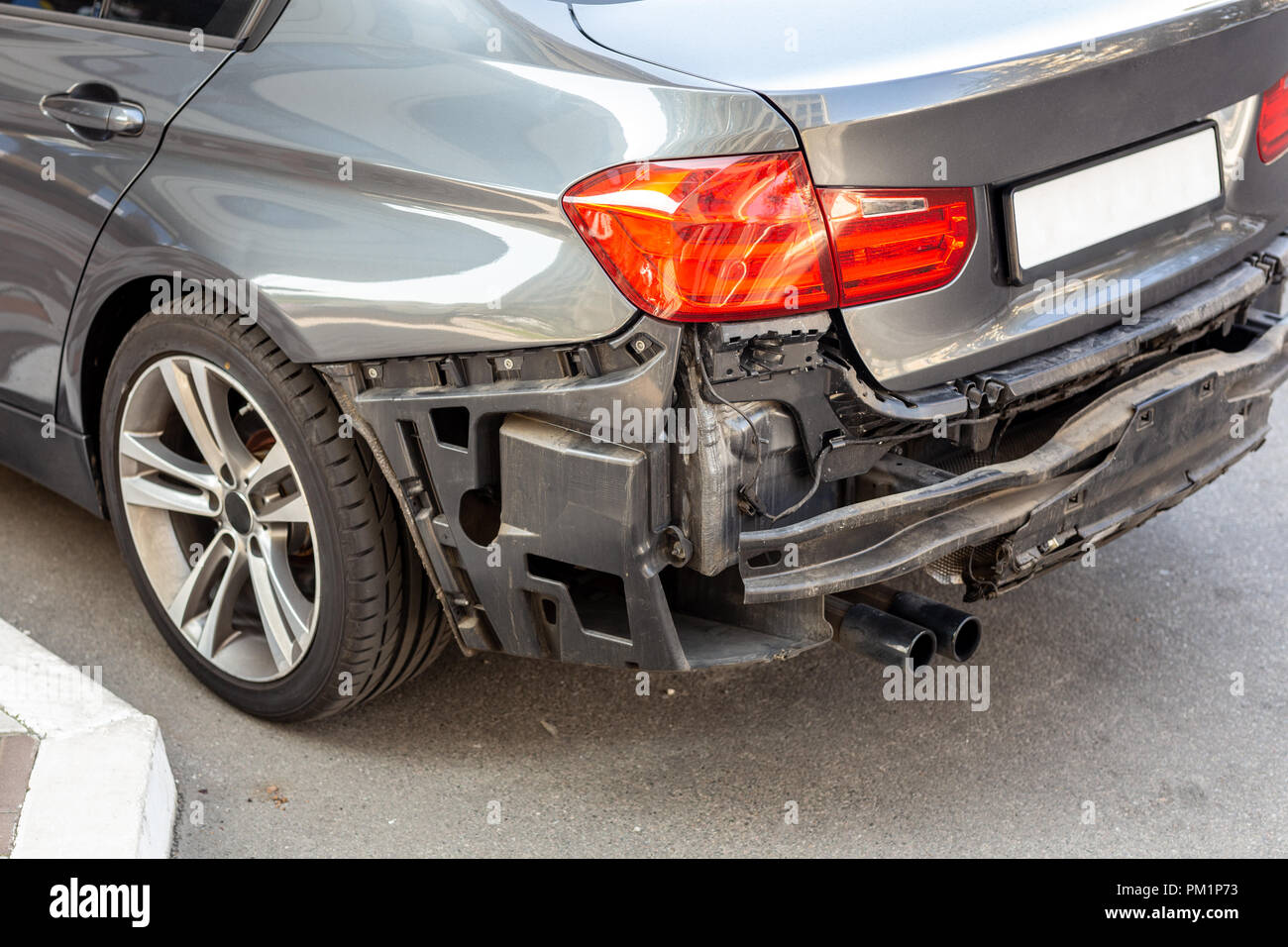 Tail of modern car with removed rear bumper. Vehicle after traffic ...