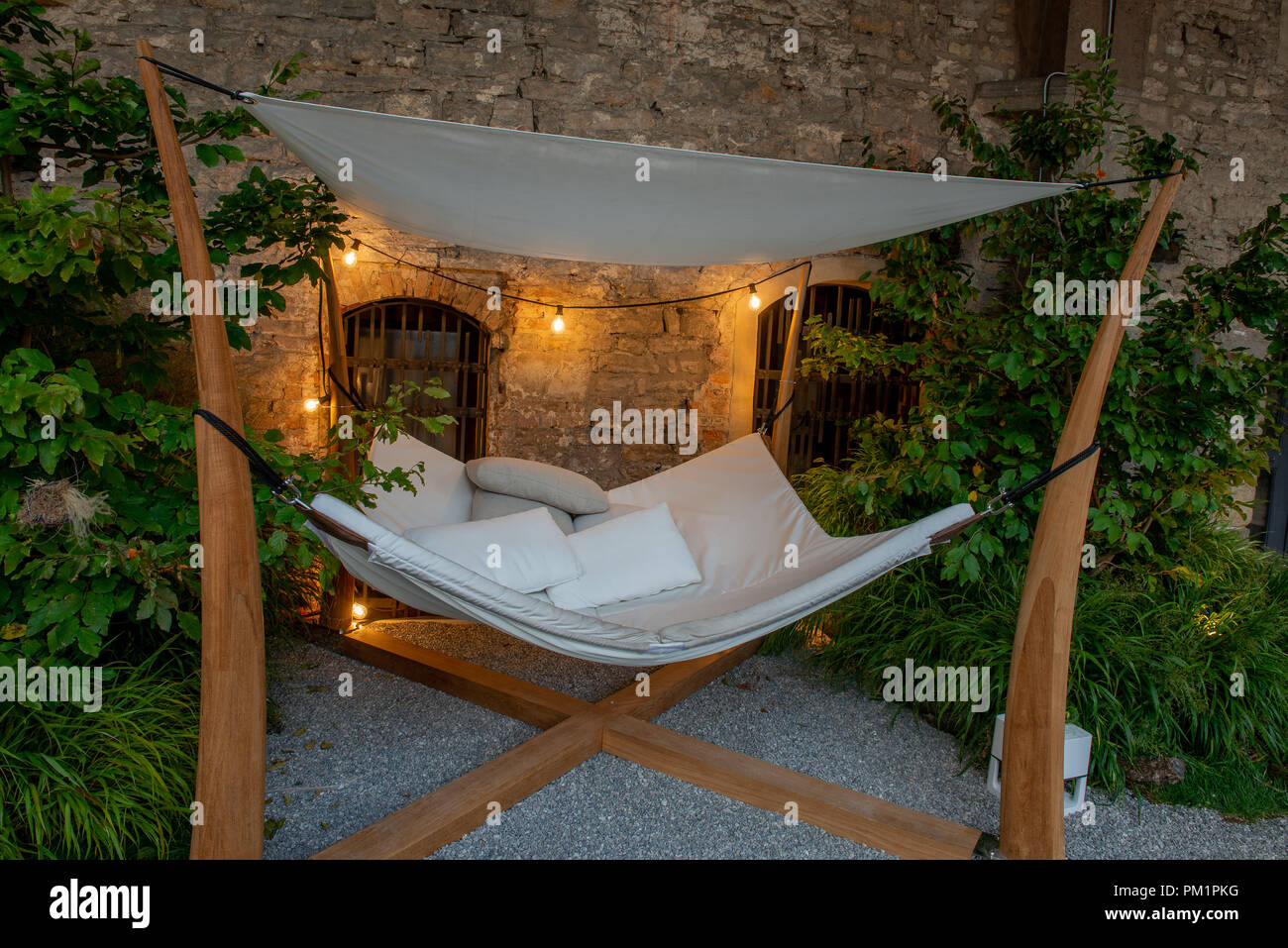 ancient dwelling garden with hammock Stock Photo - Alamy