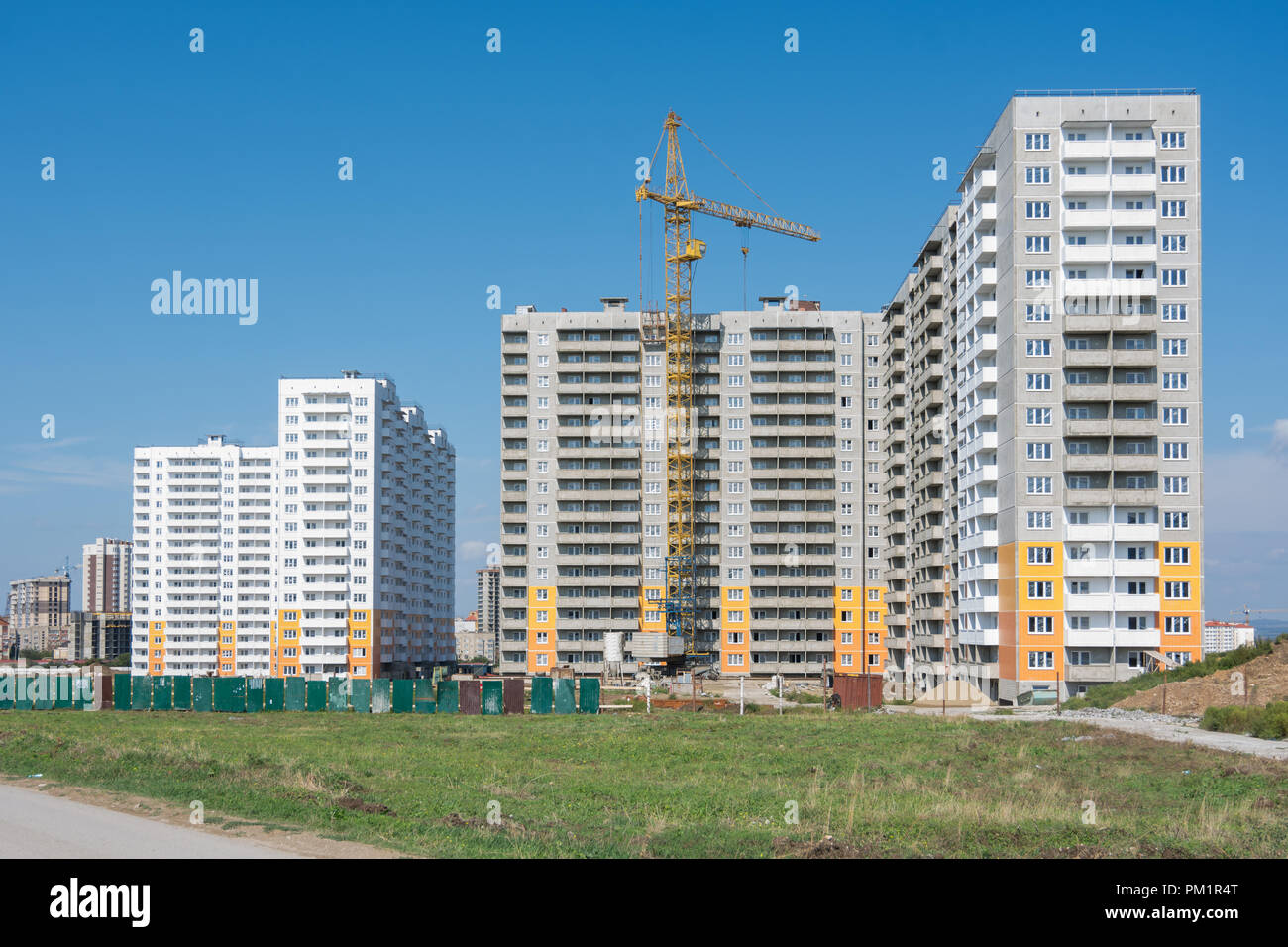 Construction of a residential complex of typical sixteen-storey block ...