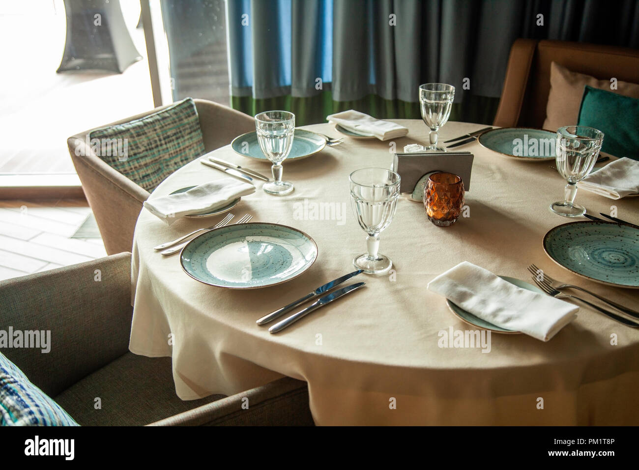 Cured table in the restaurant, cutlery plates with glasses Stock Photo ...
