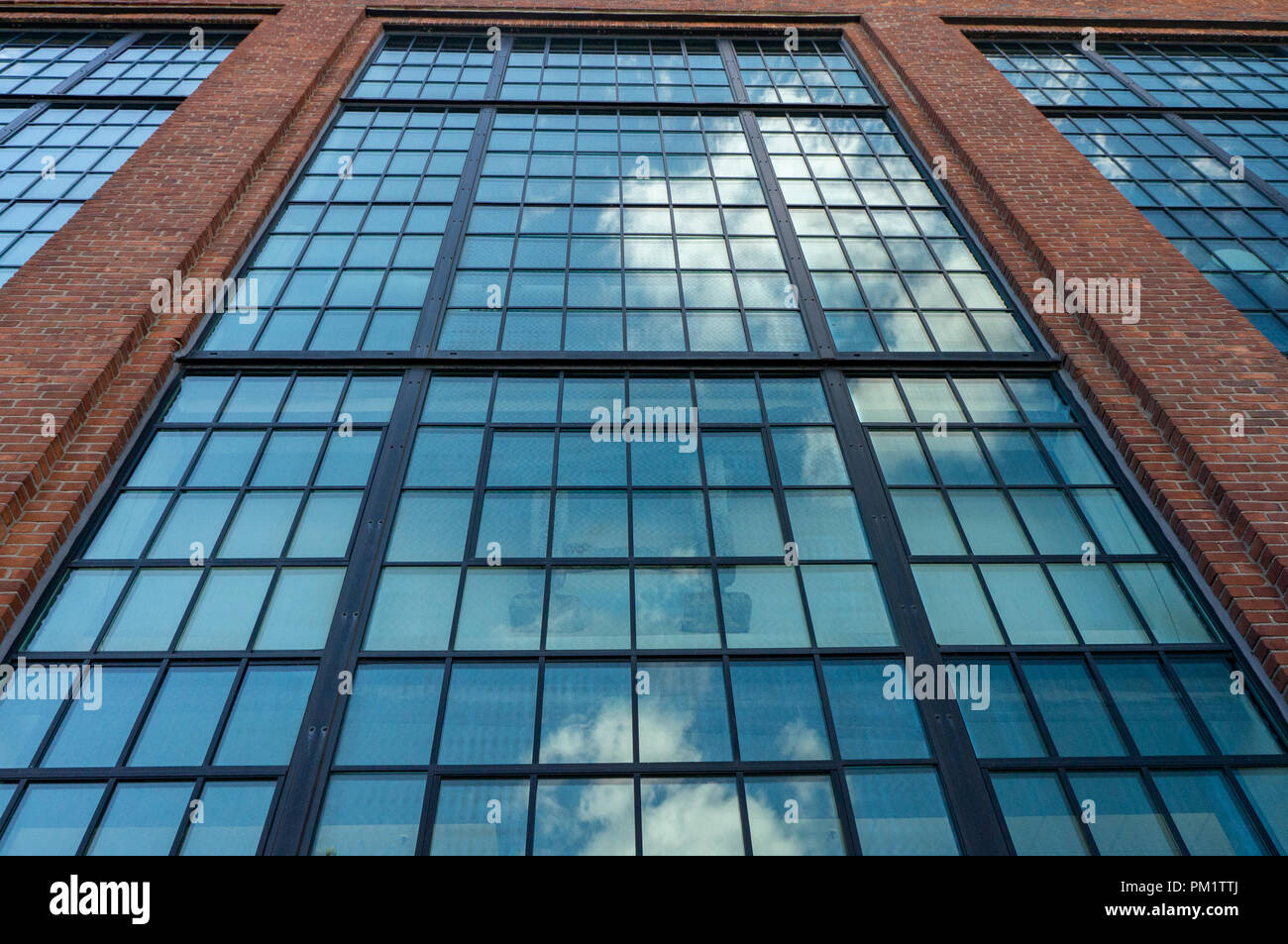 perspective shots of some nice windows that are reflecting the sky ...