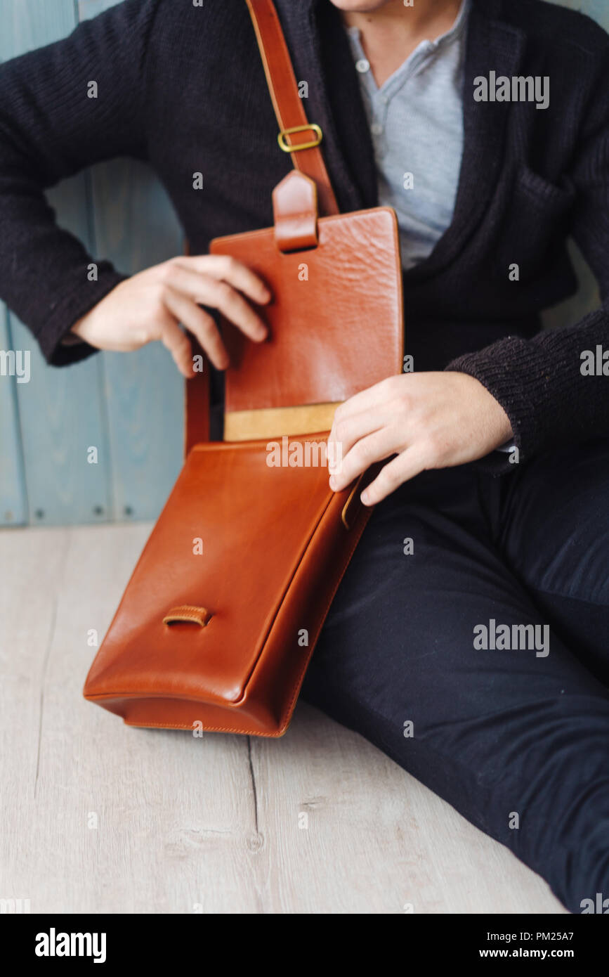 handsome guy with leather bag Stock Photo - Alamy
