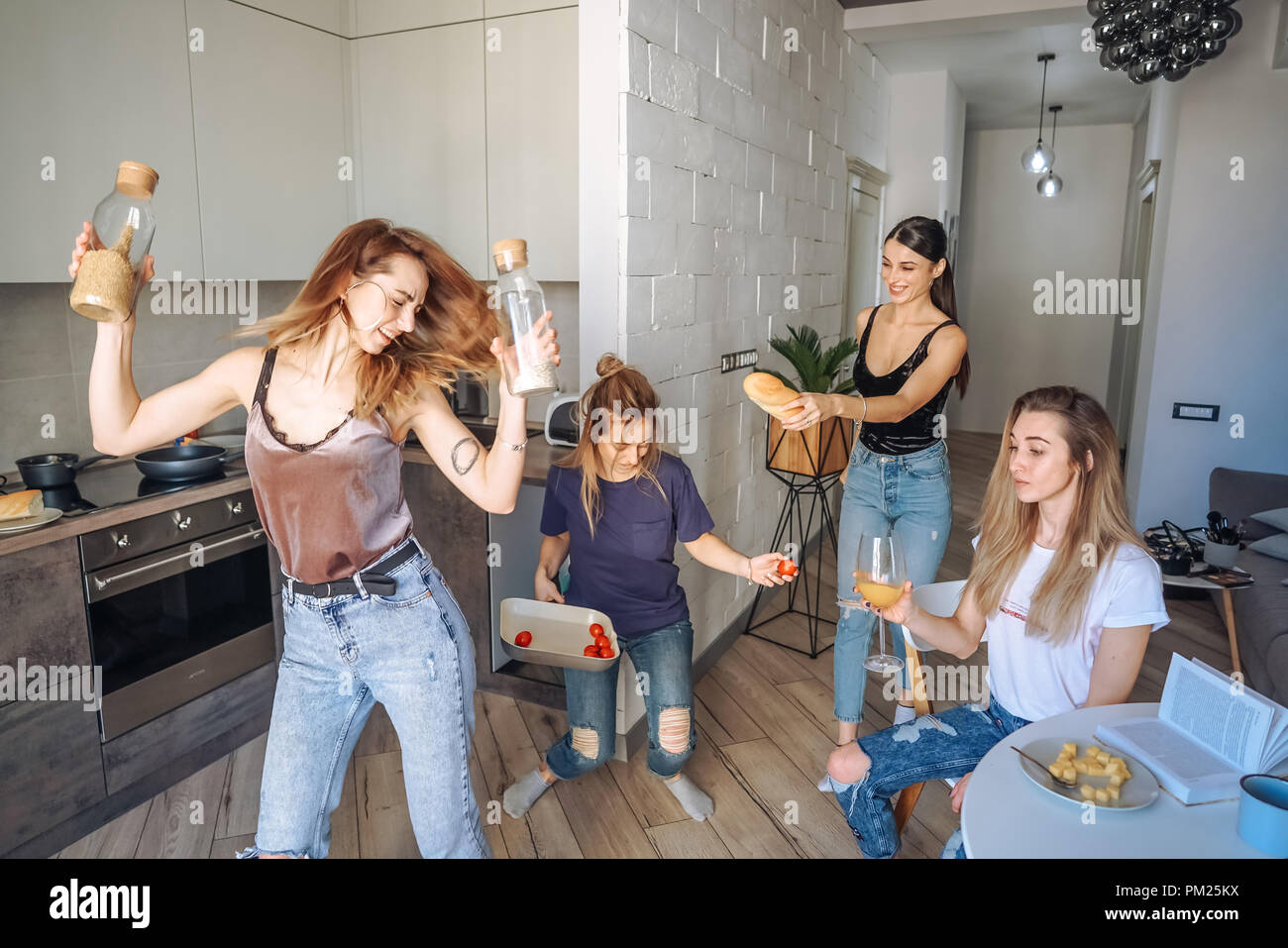 group of women in the kitchen Stock Photo - Alamy