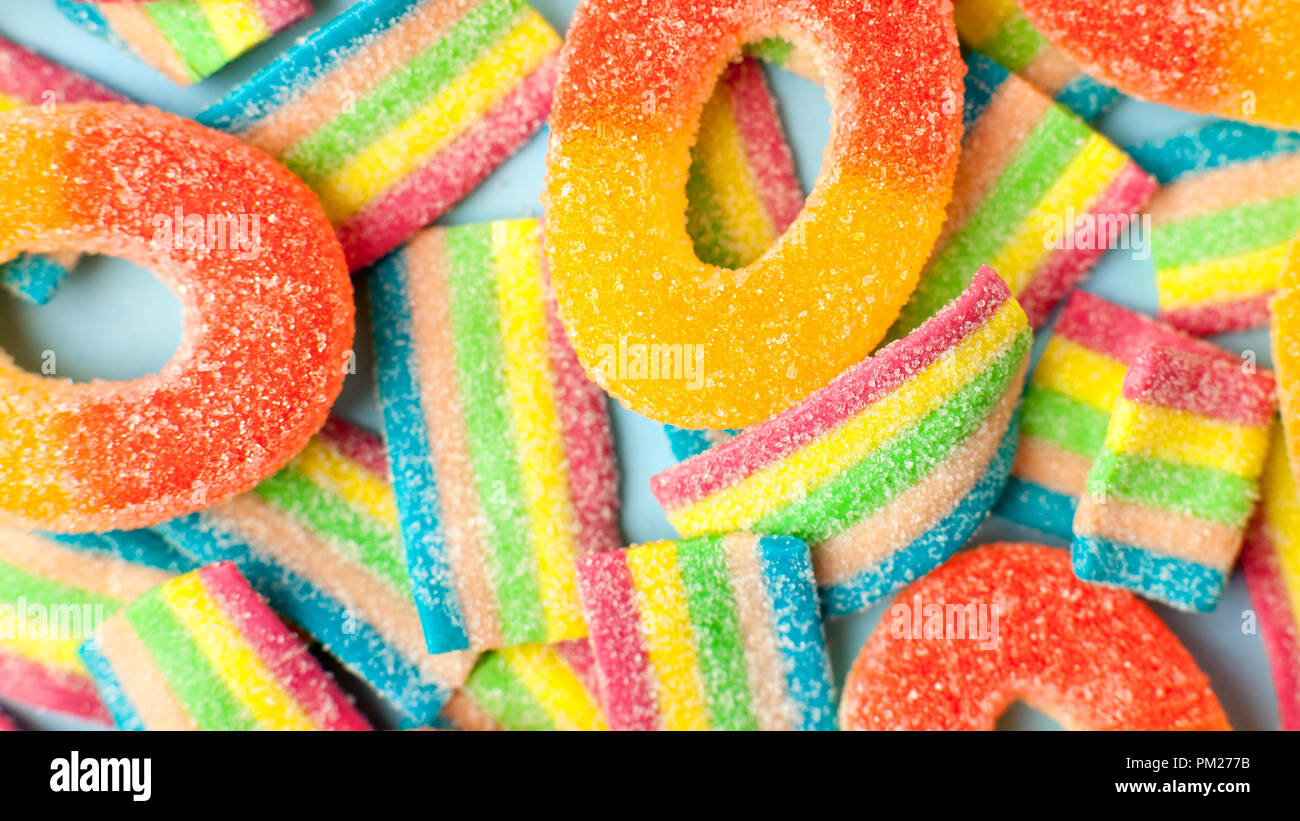 candies with jelly and sugar. colorful array of different childs sweets ...