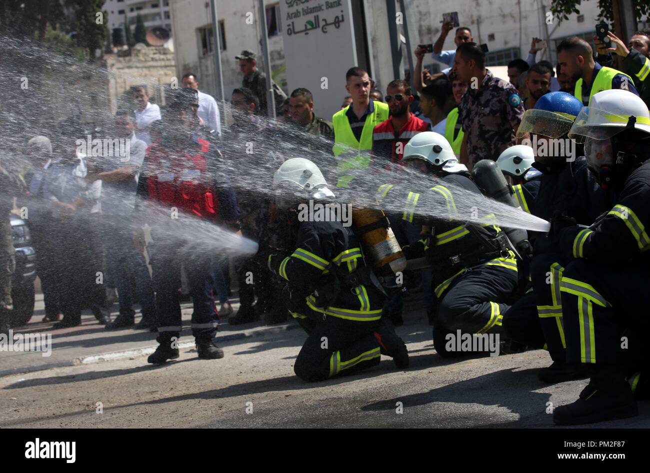 Nablus, West Bank, Palestinian Territory. 17th Sep, 2018. Palestinian Civil Defense members take ...