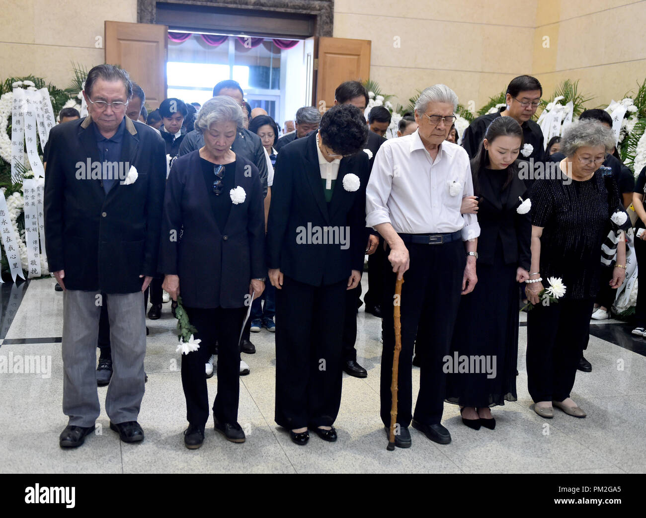 Mourners funeral china hi-res stock photography and images - Alamy