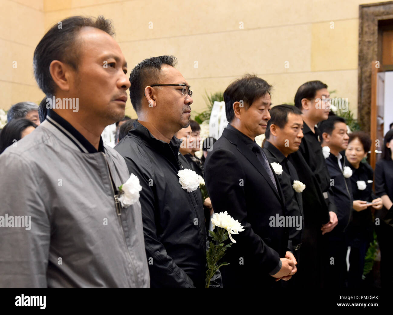 Beijing, China. 17th Sep, 2018. Actors Jiang Wu (2nd L) and Pu Cunxin ...