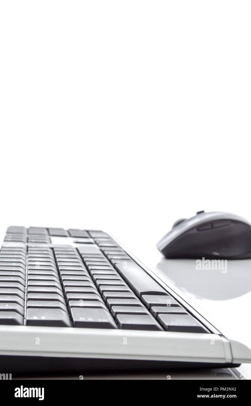 Keyboard and mouse isolated over white background Stock Photo - Alamy