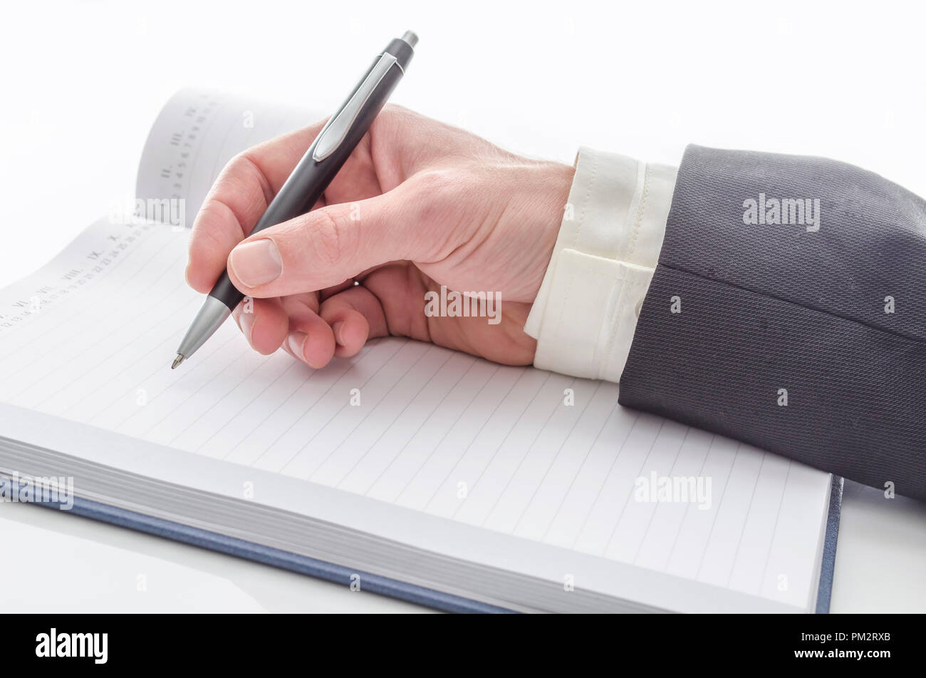 Black Man Writing On Notepad Hand High Resolution Stock Photography and ...