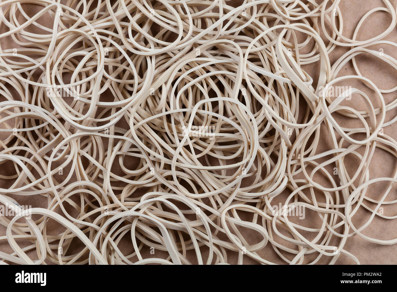 yellow Rubber Band close up for background Stock Photo - Alamy