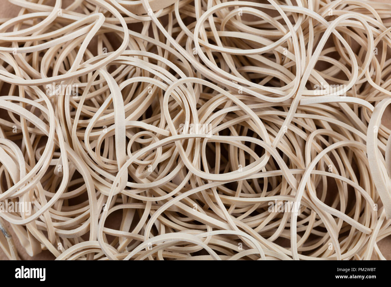 yellow Rubber Band close up for background Stock Photo - Alamy
