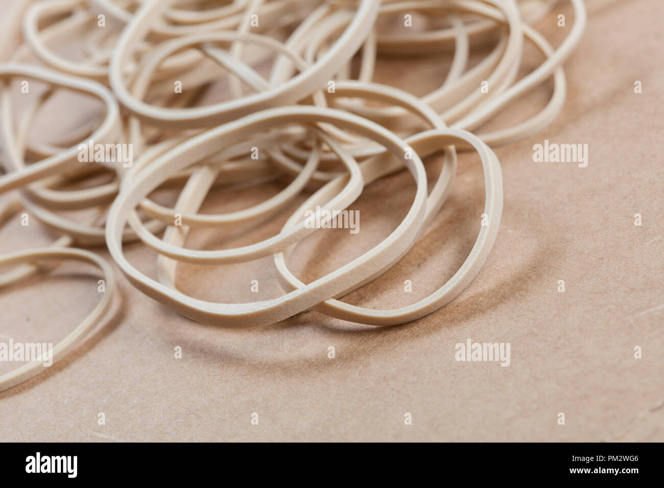 yellow Rubber Band close up for background Stock Photo - Alamy