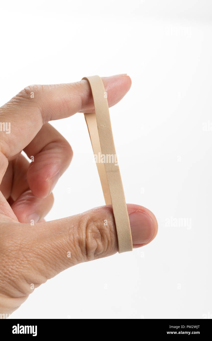 Rubber band stretching hi-res stock photography and images - Alamy