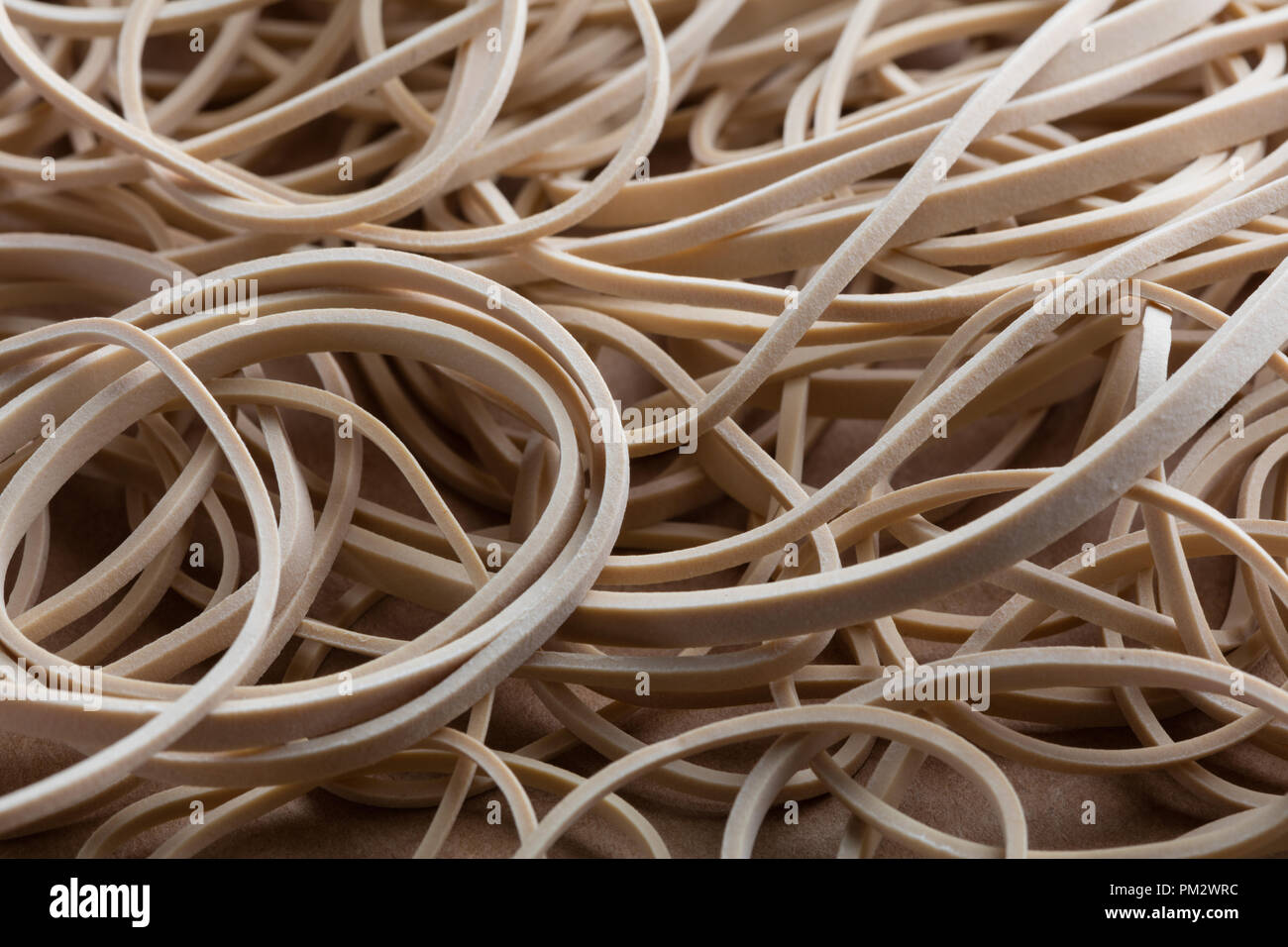 yellow Rubber Band close up for background Stock Photo - Alamy