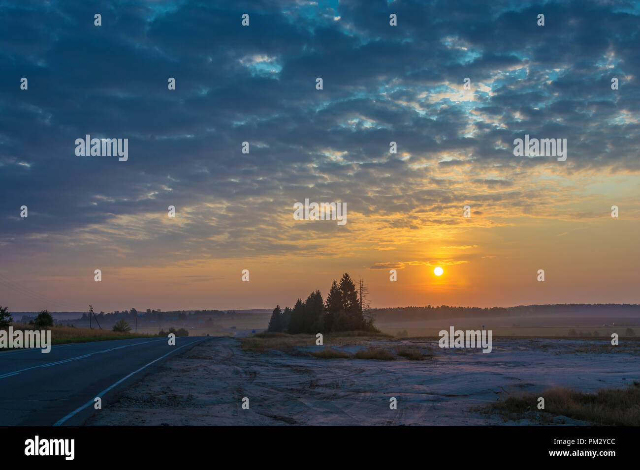 Beautiful sunrise in the open area with hazy haze and cloudy sky Stock ...