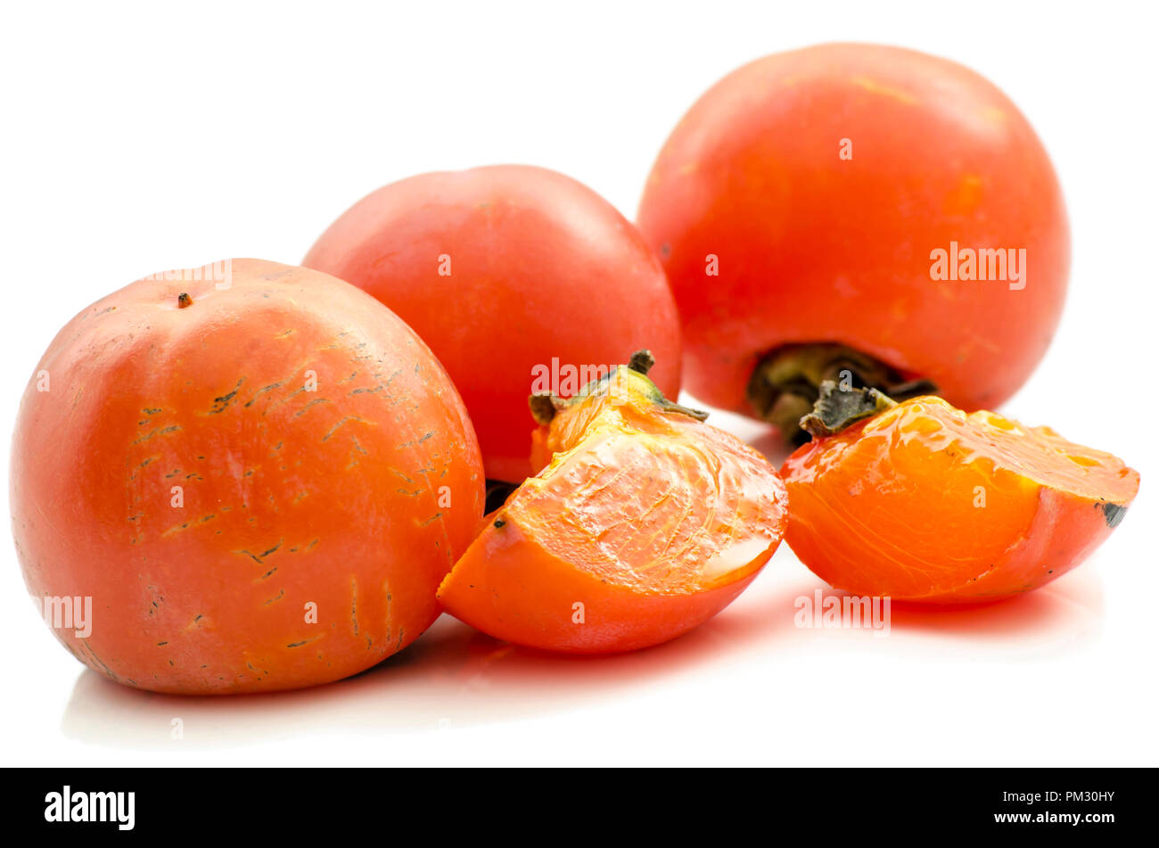Persimmon slices Cut Out Stock Images & Pictures - Alamy