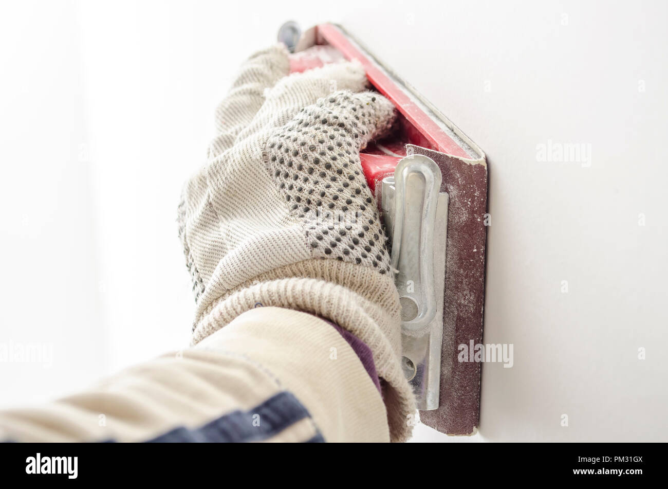Builder polishing wall hi-res stock photography and images - Alamy