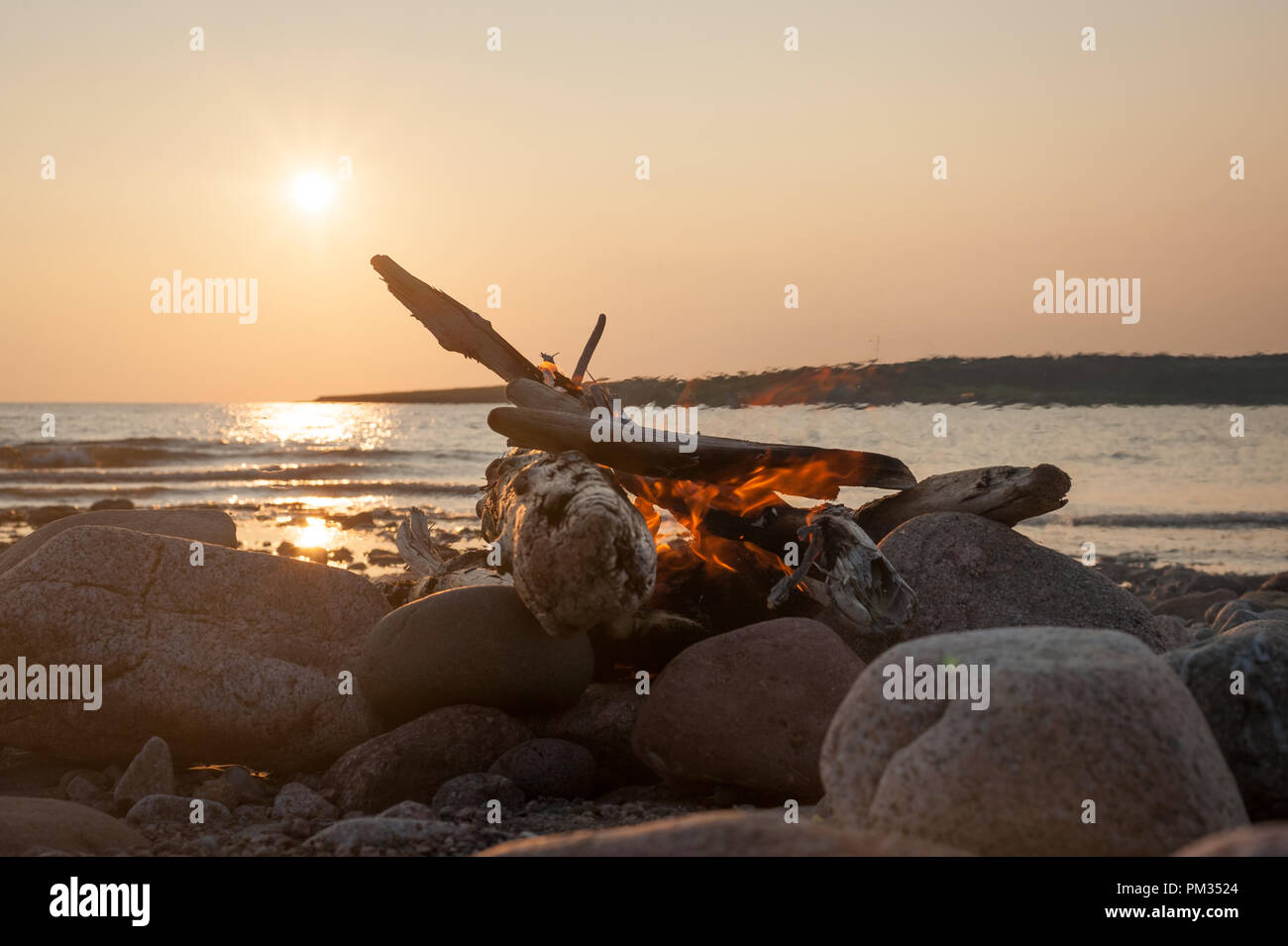 Campfire on the beach, Cheticamp, NS, Canada Stock Photo - Alamy