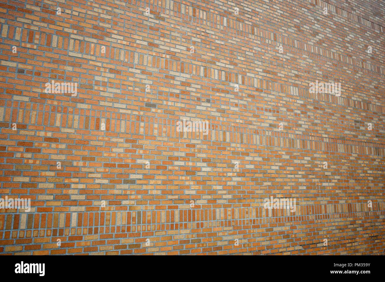 Brick wall with an interesting pattern, taken from a slight angle Stock ...